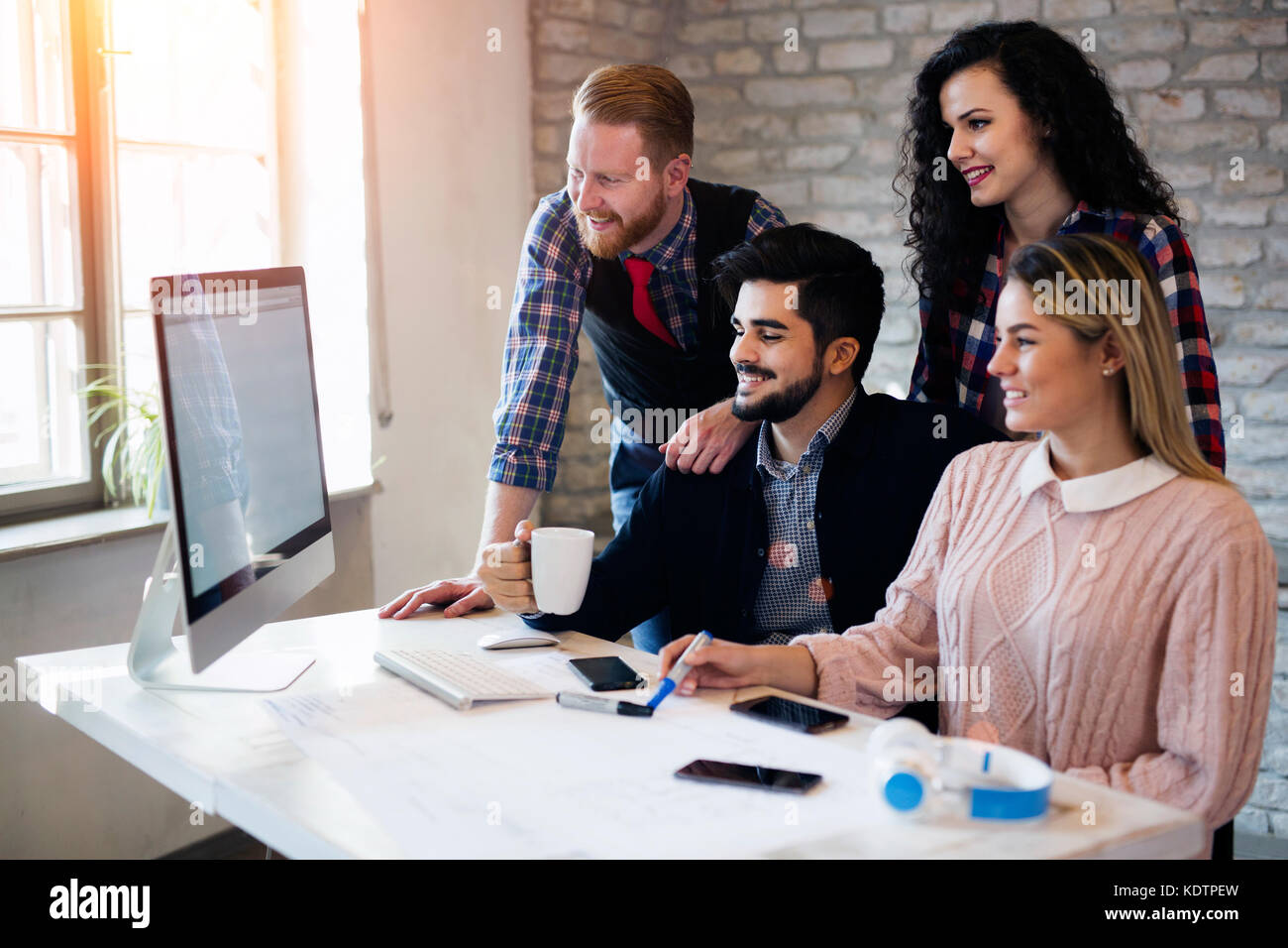 Young workplace hi-res stock photography and images - Alamy