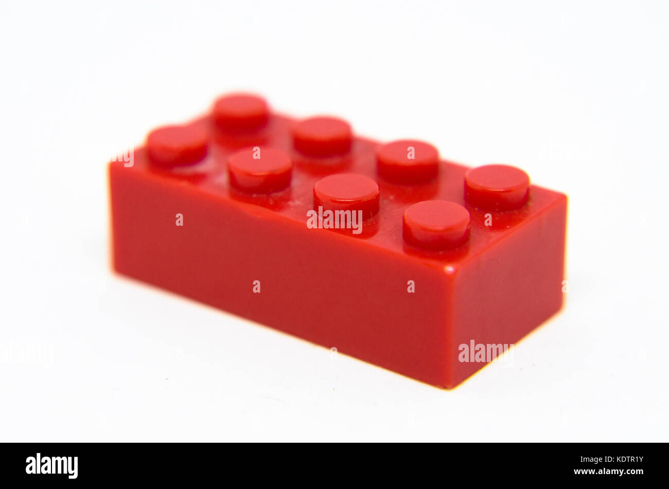 red toy brick/plastic block isolated on a white background Stock Photo ...