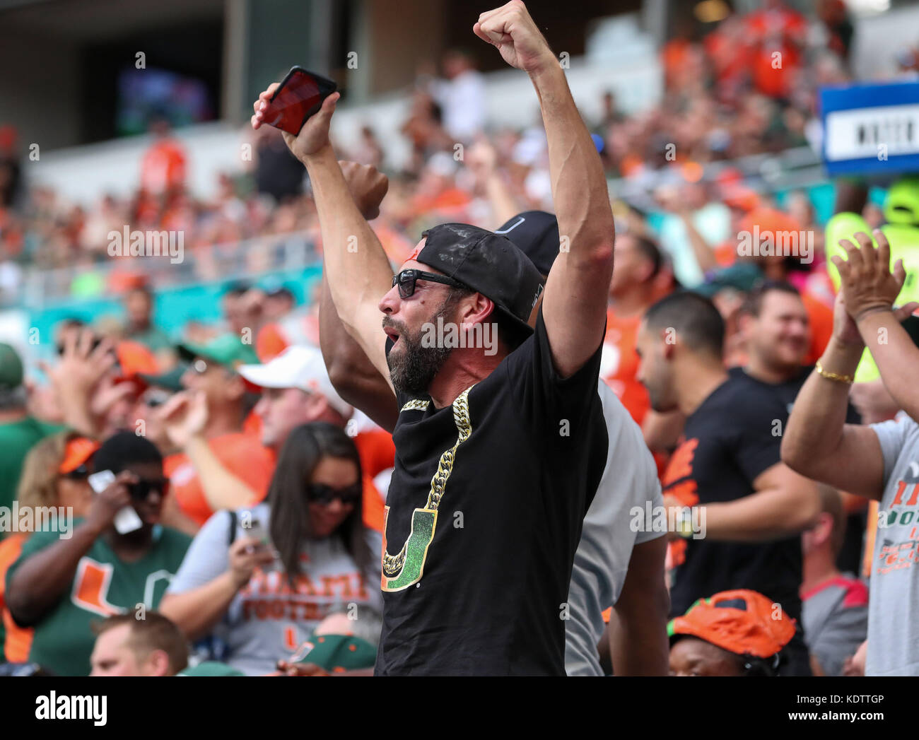 Miami Gardens, Florida, USA. 14th Oct, 2017. A Miami Hurricanes fan ...