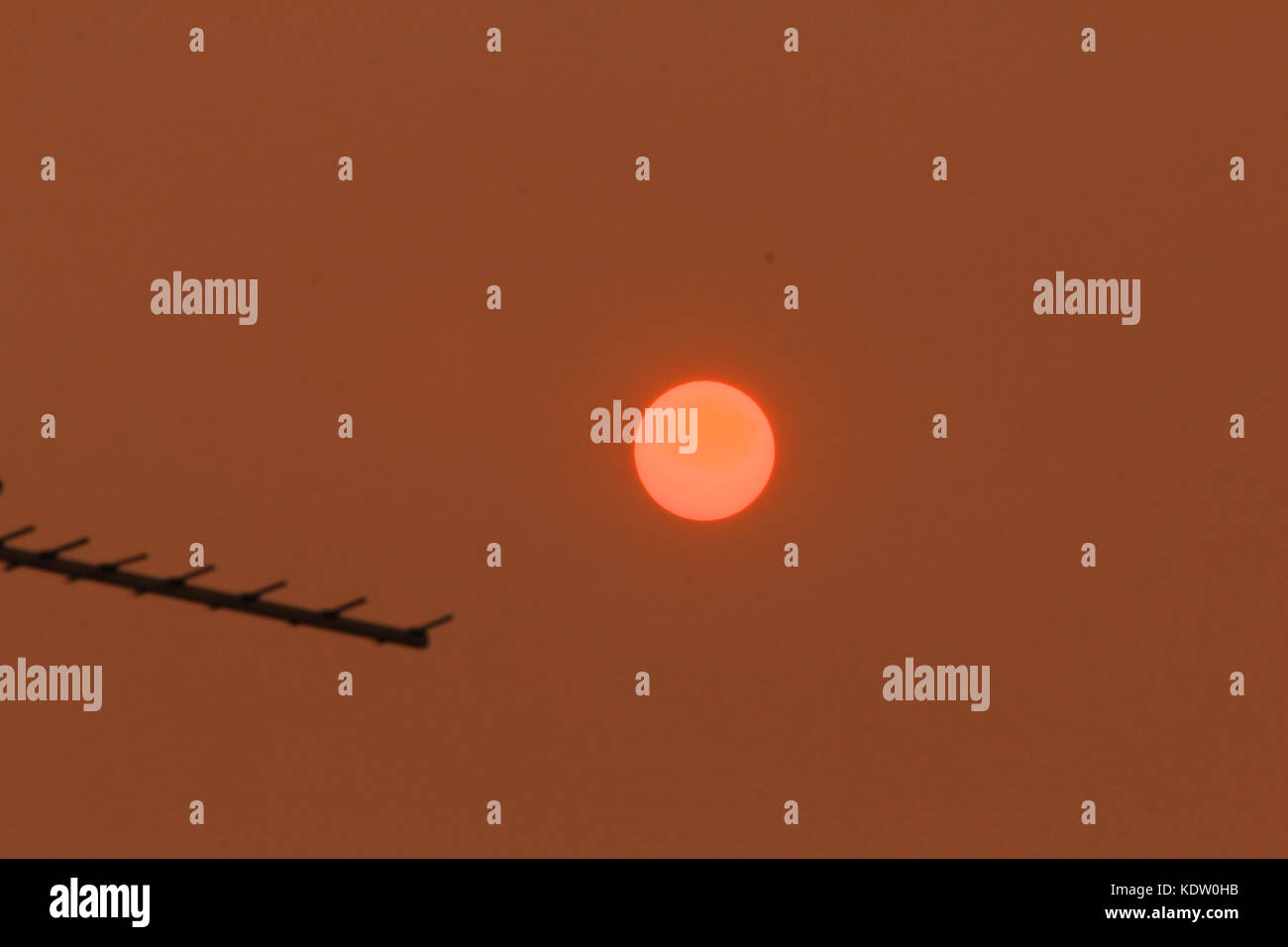 Bristol, England - 16th October 2017: Red sun. An unusual reddish sky ...