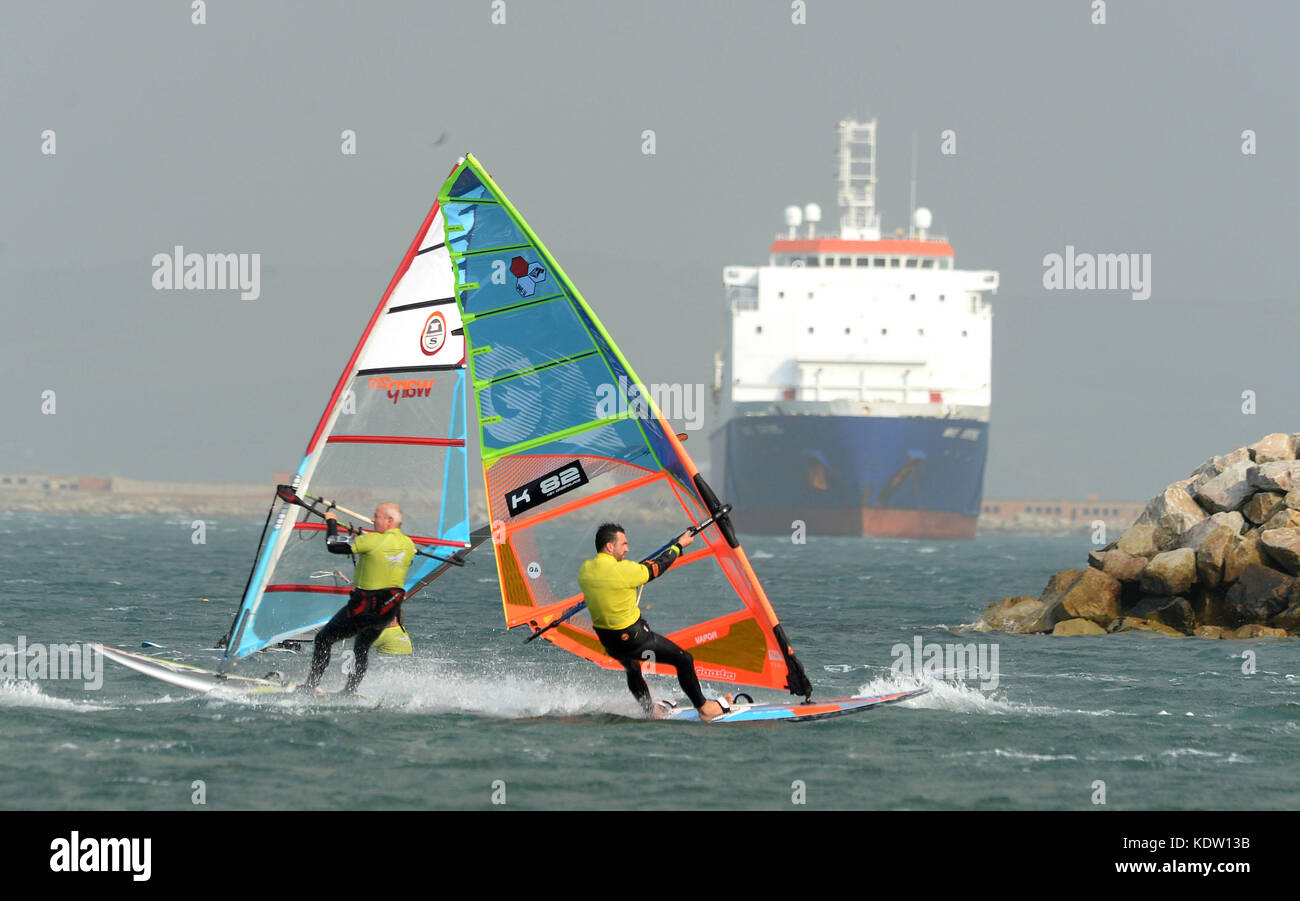 Windsurfers enjoy the strong winds bought in by Storm Ophelia in ...