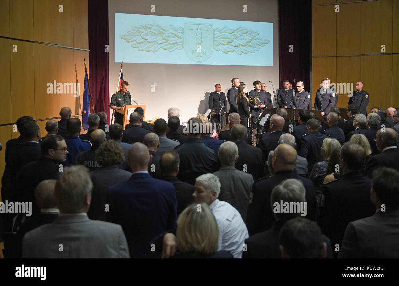 The commander of the GSG 9, Jerome Fuchs, asks the audience for a ...