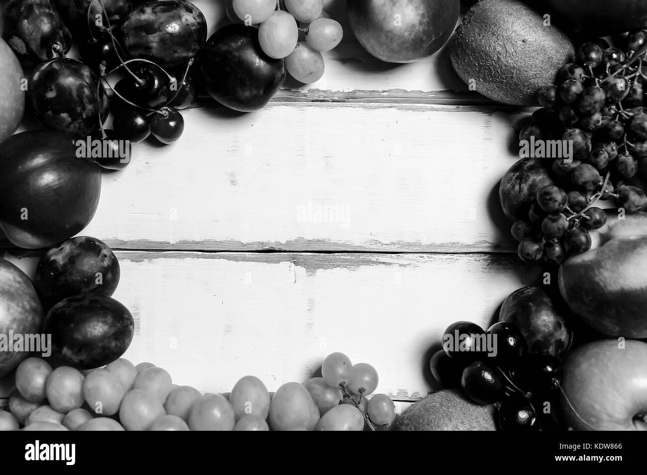 Frame of fruit on the table black and white poster Stock Photo - Alamy