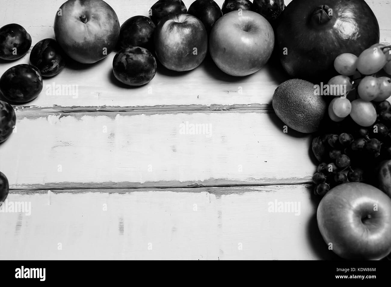 Frame of fruit on the table black and white poster Stock Photo - Alamy