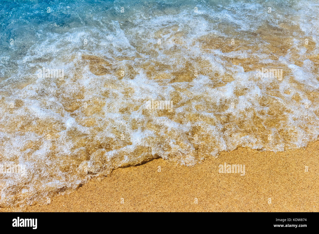Wave of the sea on the sand beach Stock Photo - Alamy