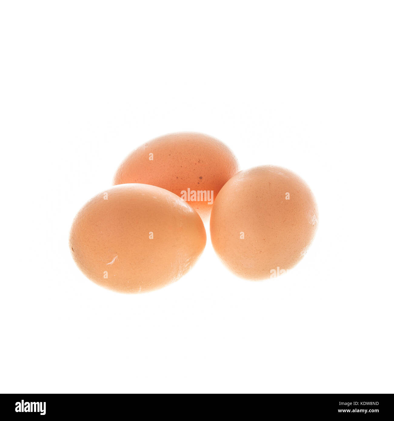 three eggs isolated on white background Stock Photo - Alamy