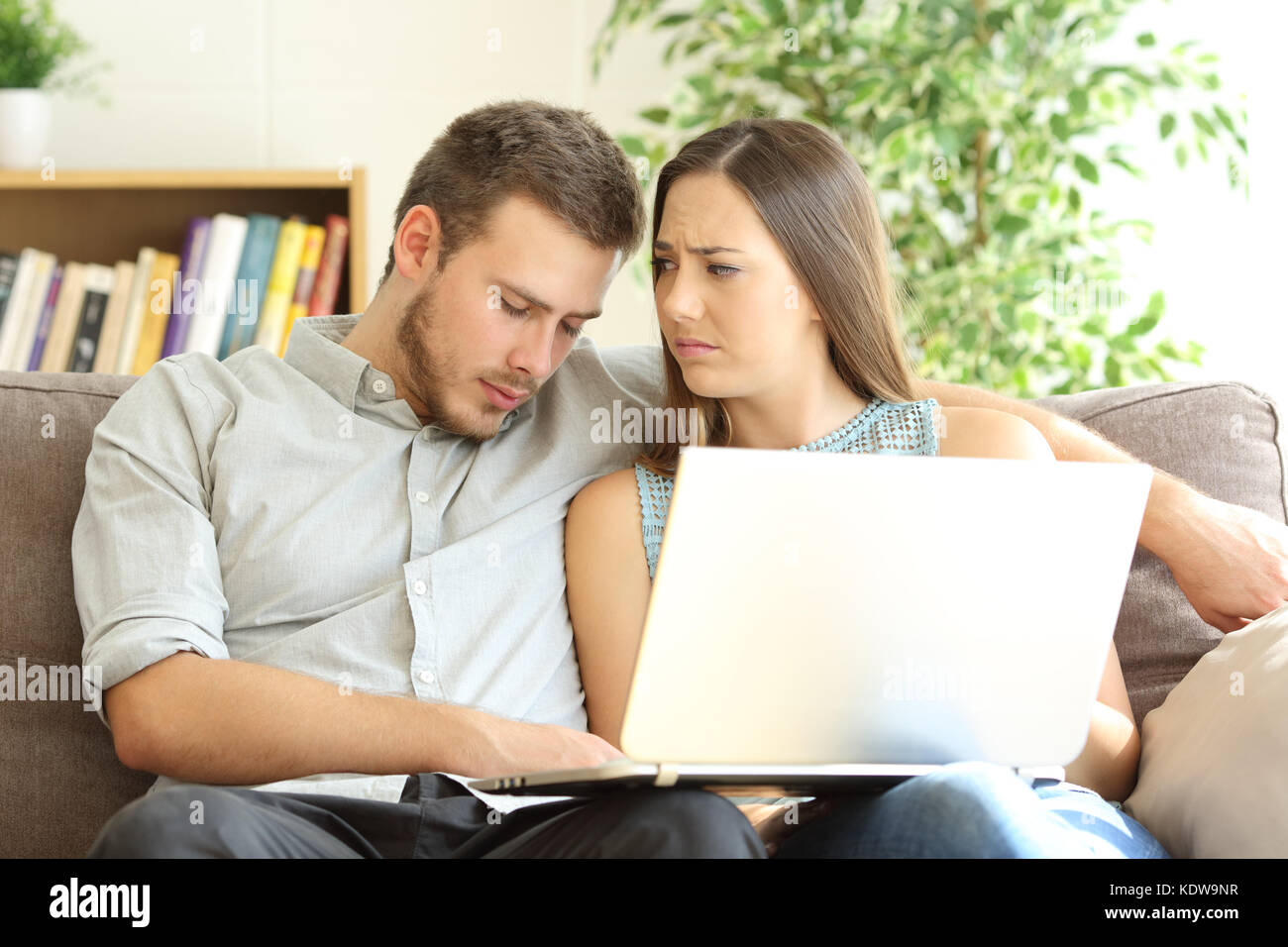 Angry man watching tv on hi-res stock photography and images - Alamy