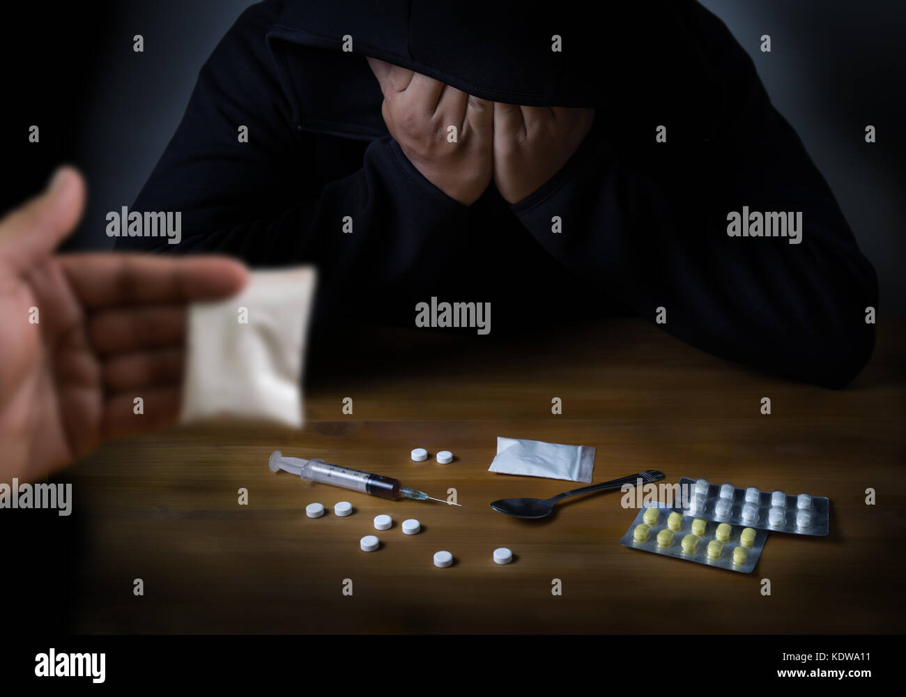 man substance dependence medication Drug syringe and cooked heroin ...