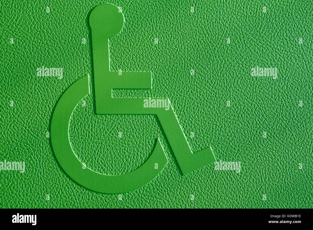 Disabled symbol on a green textured background. Horizontal Stock Photo ...