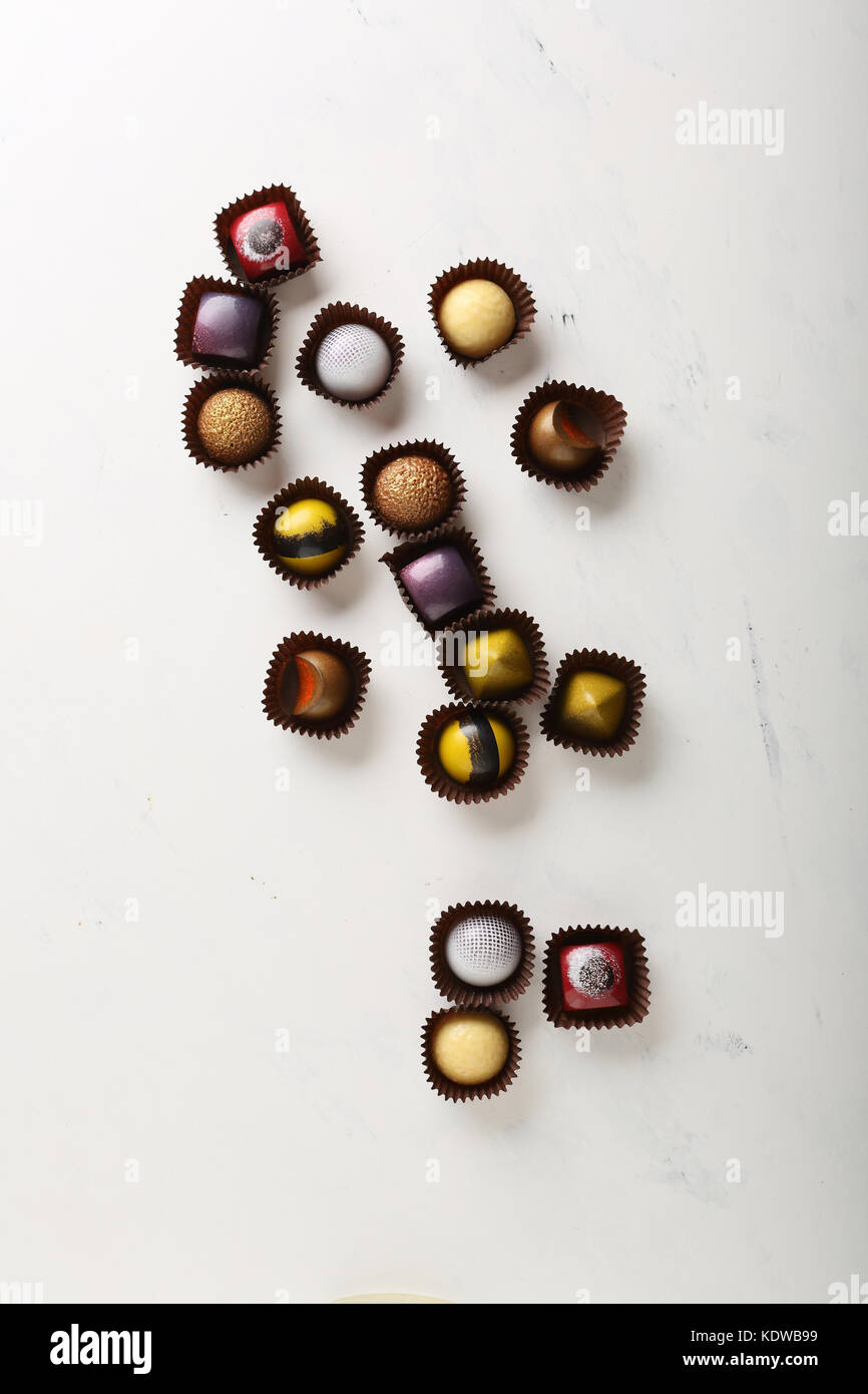 variety chocolate praline on white background, food top view Stock ...