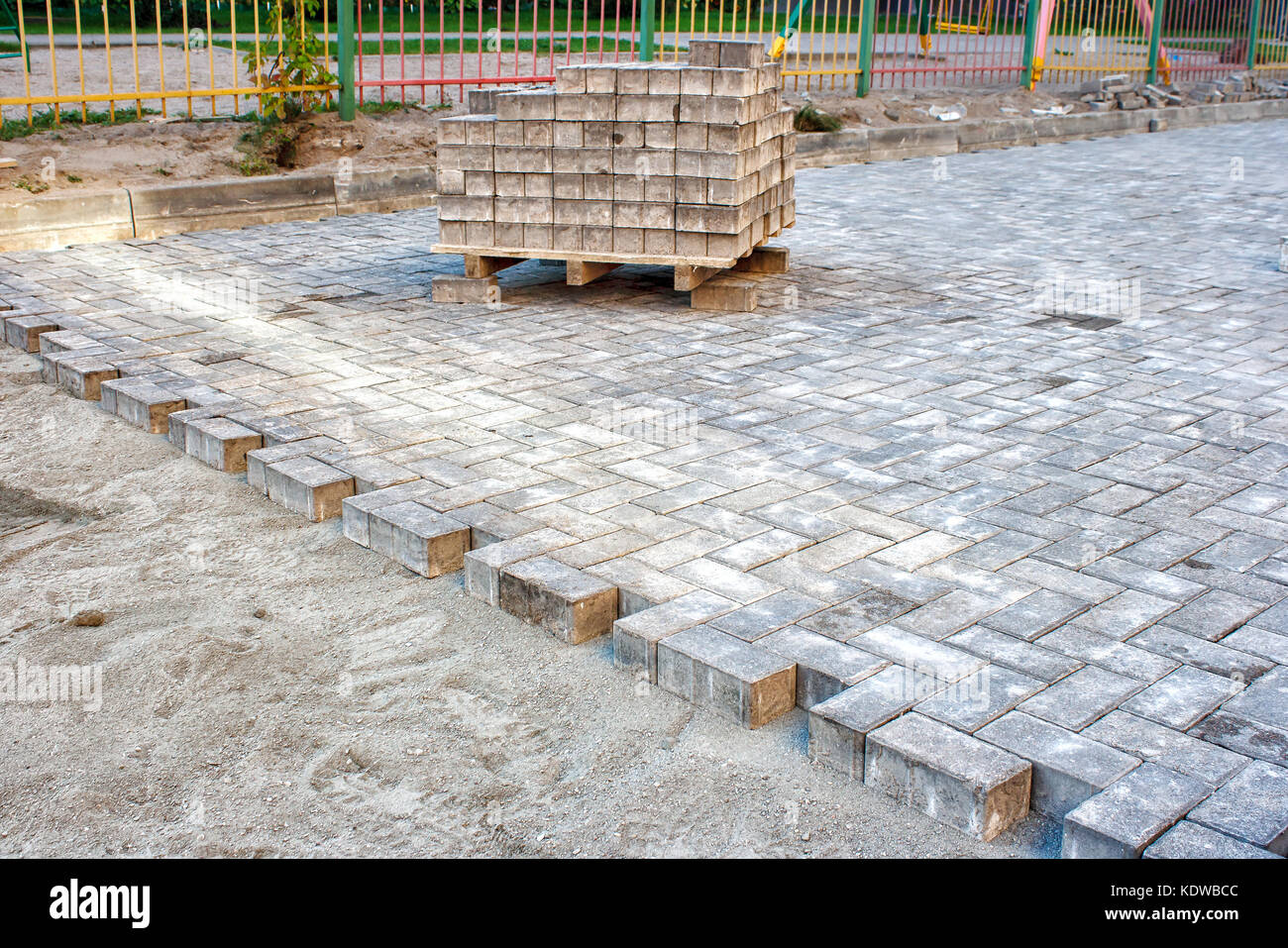 construction of a new modern road with paving slabs in the city on ...