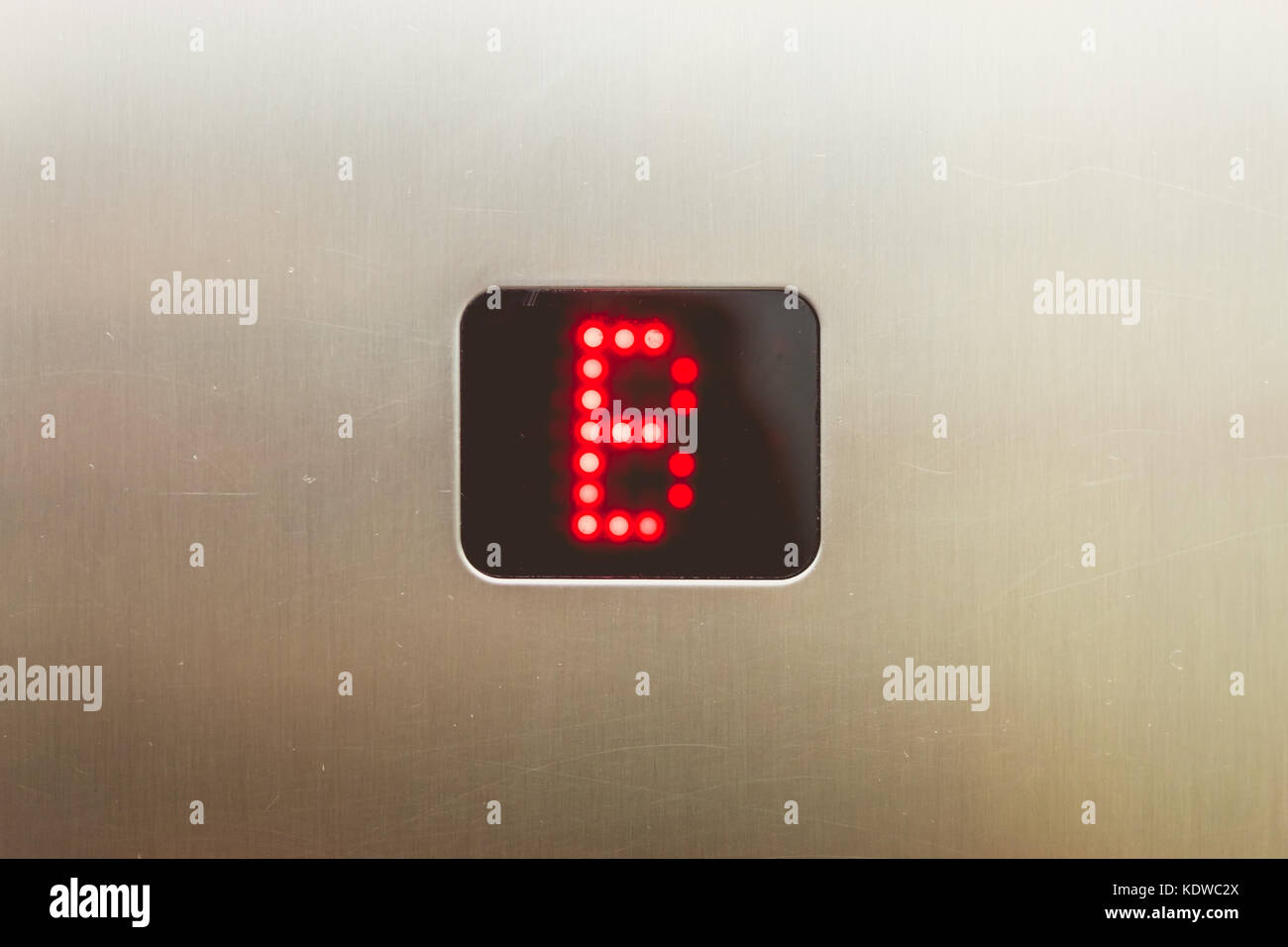 led panel on a brushed metal plate in an elevator that displays the ...
