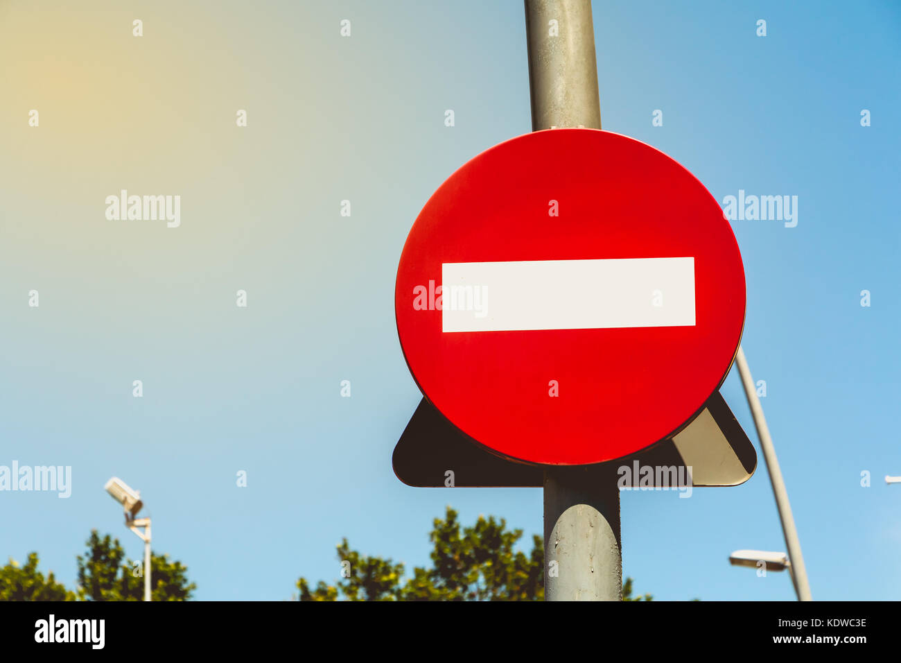close up round sign of forbidden meaning on a blue sky Stock Photo - Alamy