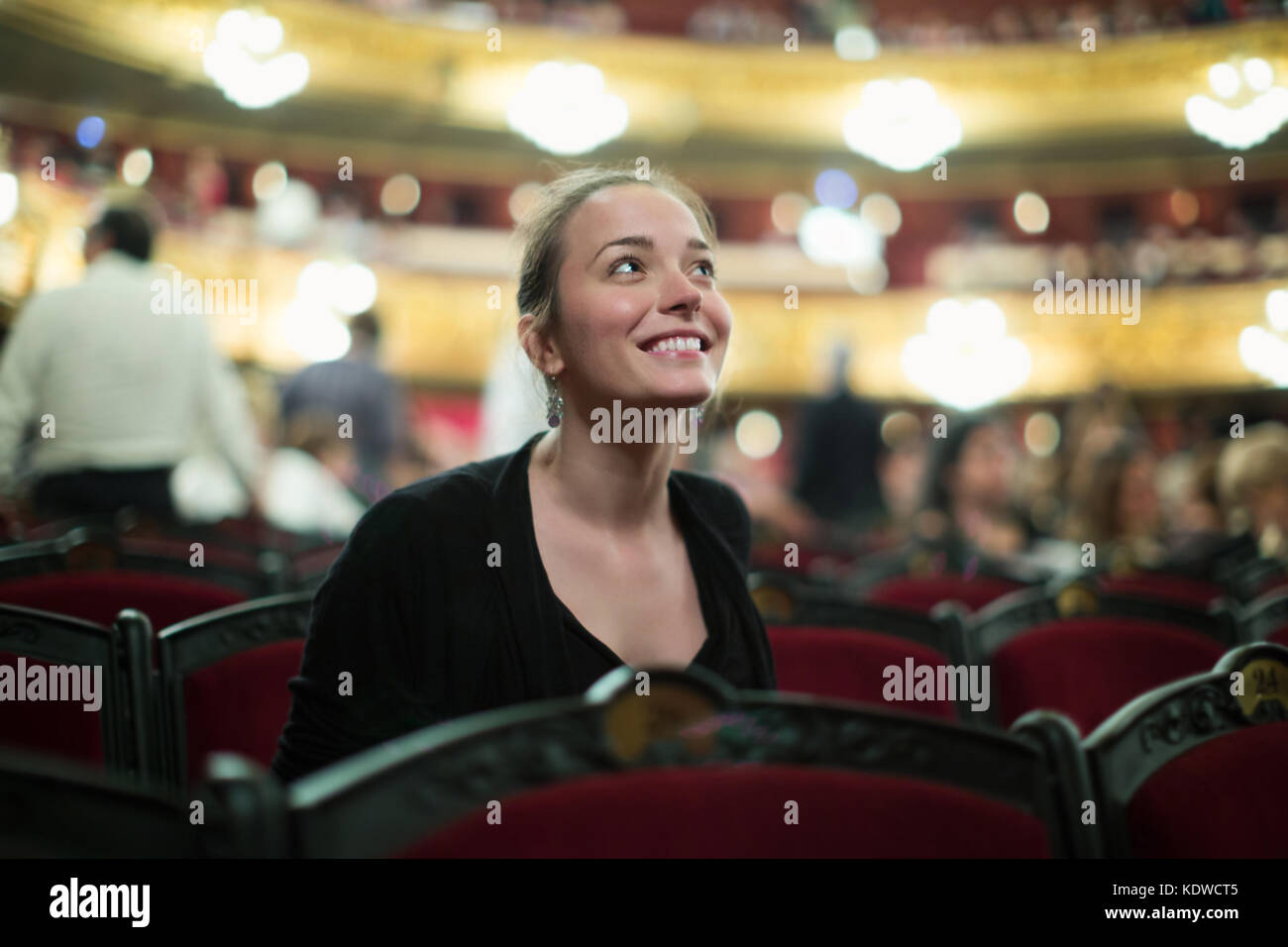 Portrait of woman in auditorium of opera teatre Stock Photo - Alamy