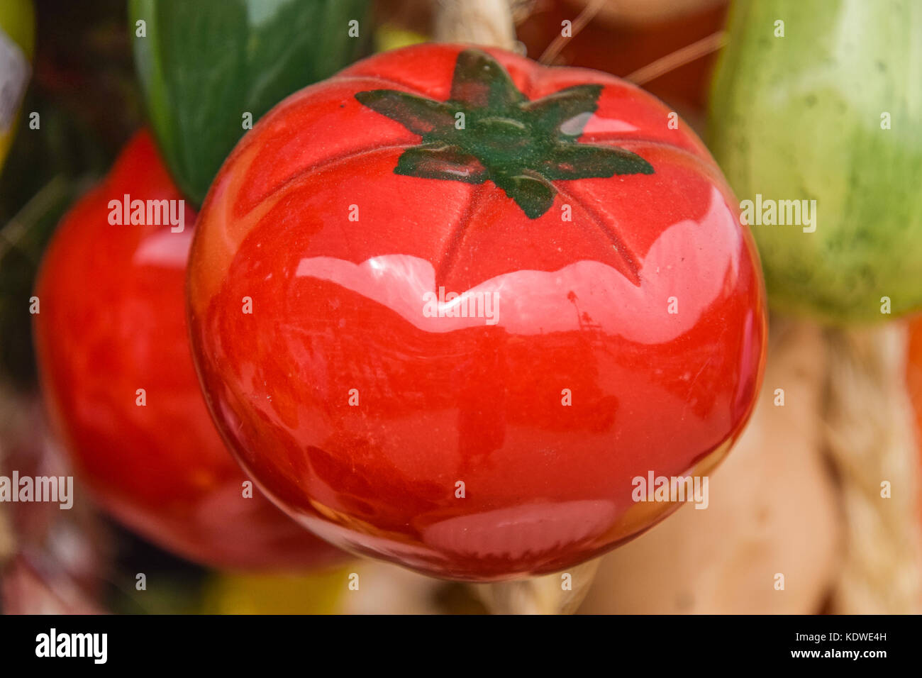 Red Tomato made out of clay Stock Photo - Alamy