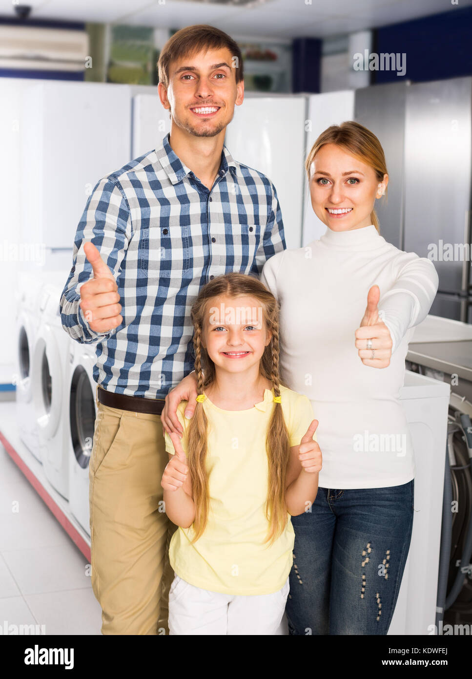 cheerful family shopping in household appliance store Stock Photo - Alamy