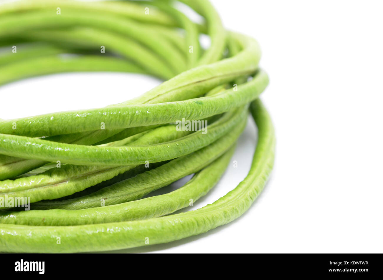 Bunch of fresh long bean isolated on white background Stock Photo - Alamy