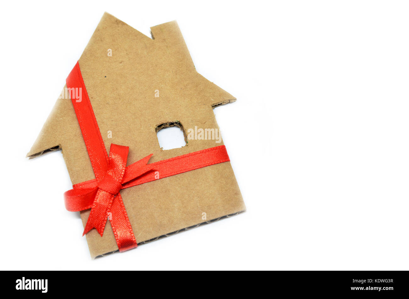 House from cardboard with ribbon. House concept Stock Photo - Alamy