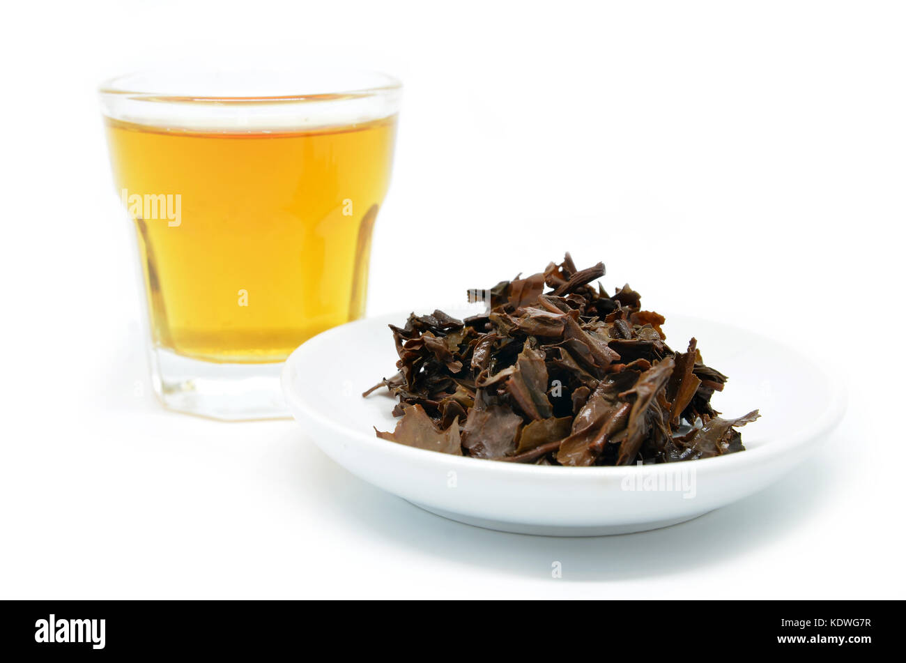 Tea in a glass cup with used tea leave Stock Photo - Alamy