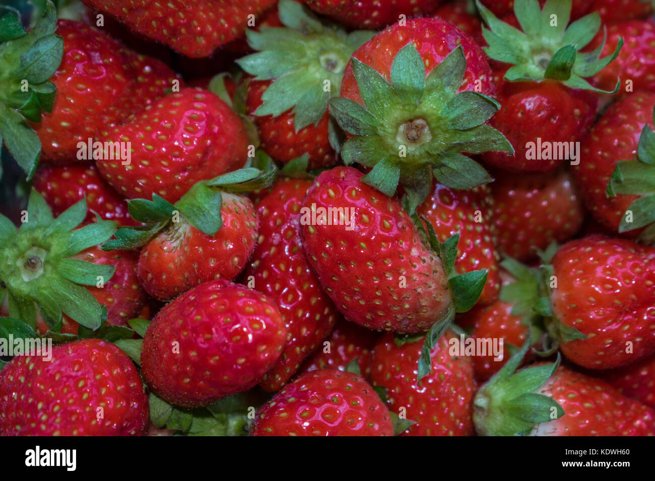 Bright red strawberry fruit healthy food Stock Photo - Alamy