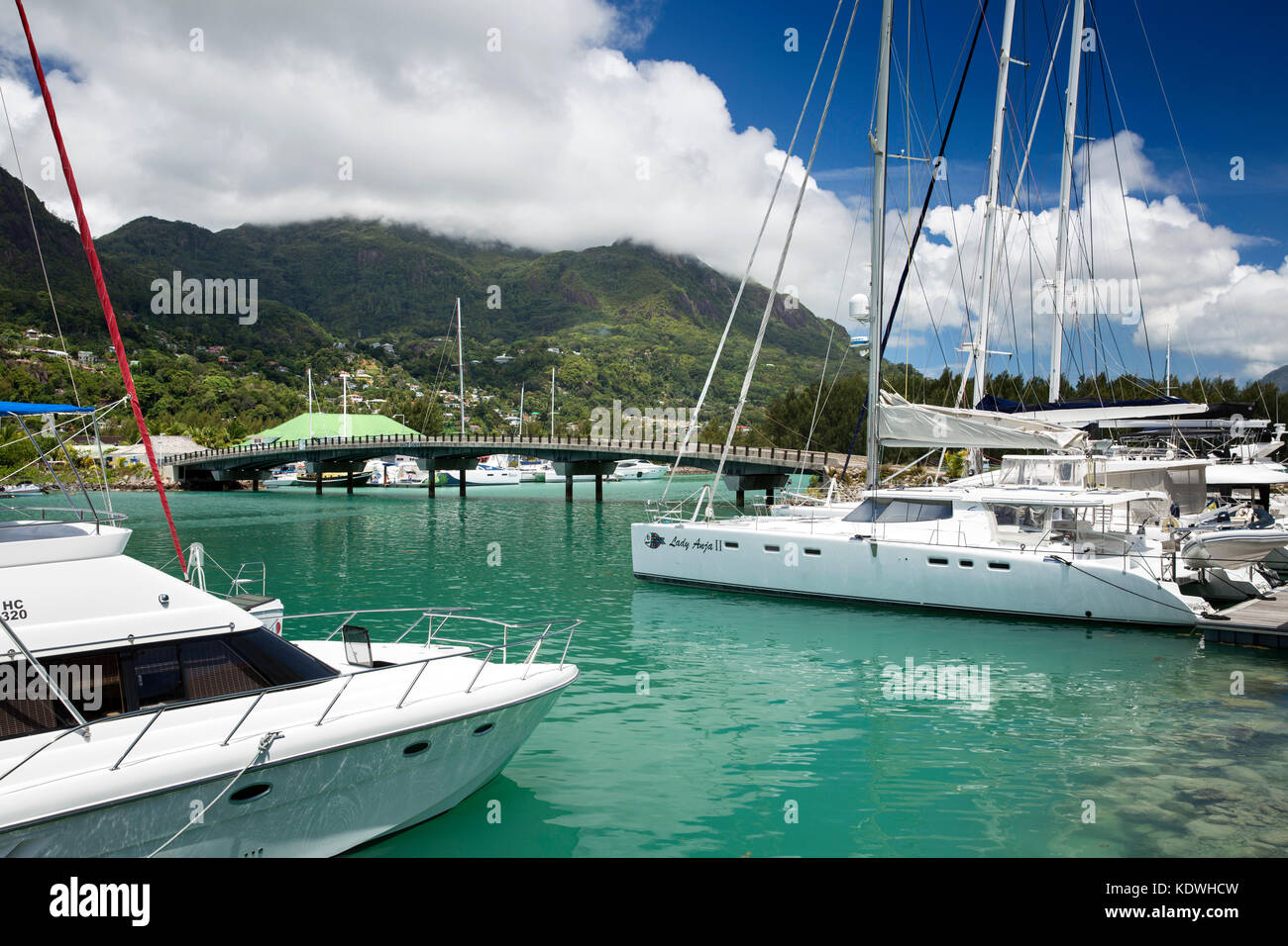 The Seychelles, Mahe, Victoria, Eden Island, bridge and sailing boats ...