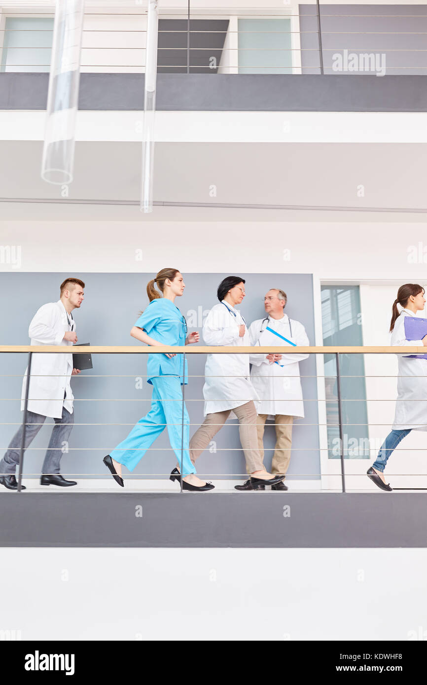 Team of doctors have emergency and run in hospital hallway Stock Photo ...