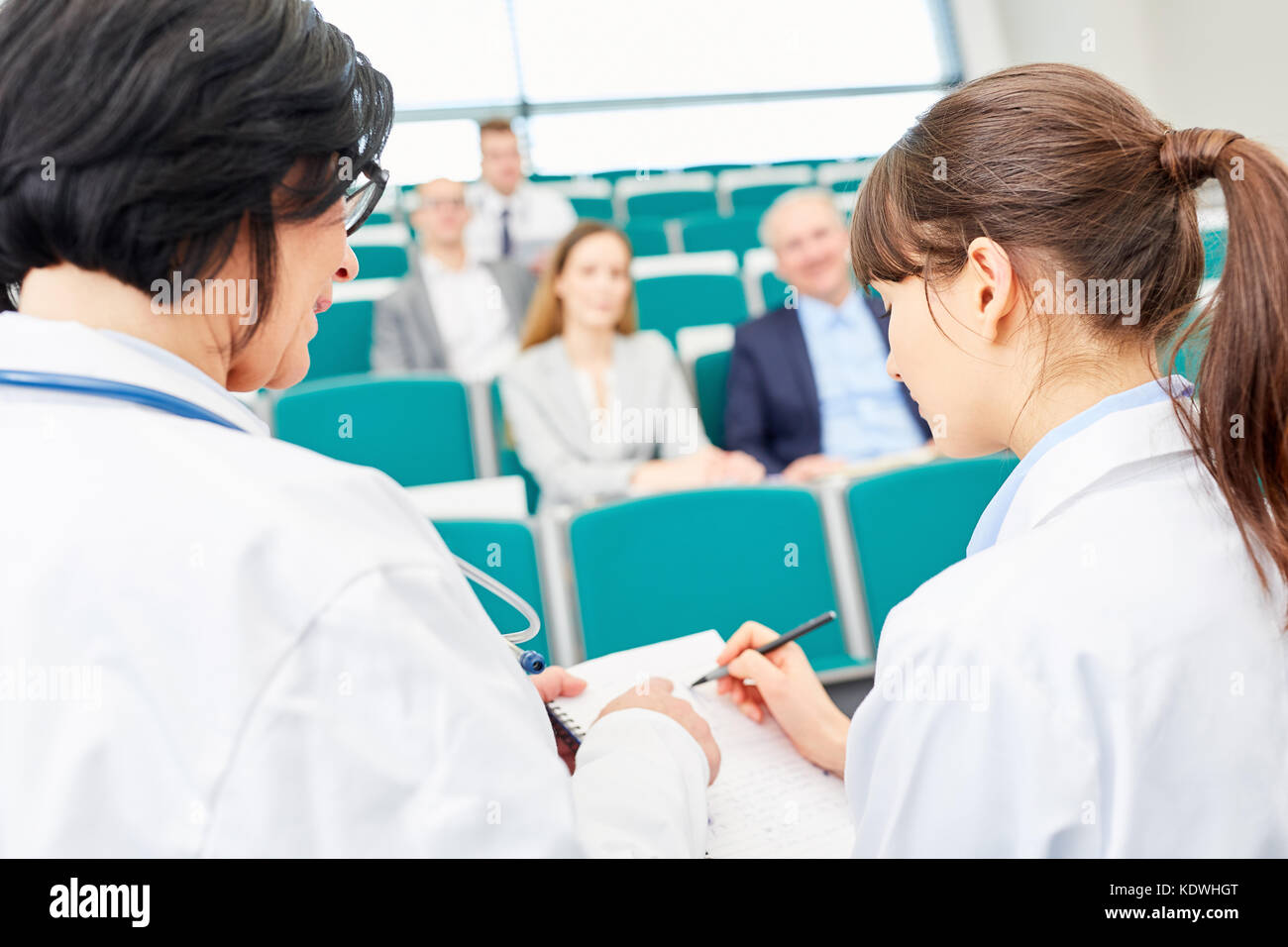 Young woman as student presenting physician exam in medical school ...