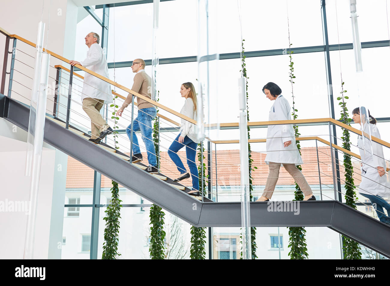 Team of doctors as a group together in hospital or clinic Stock Photo ...