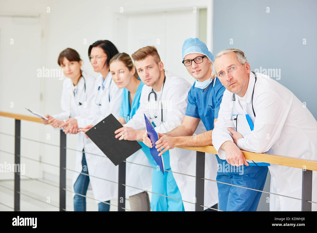 Team of doctors with young physicians in their training Stock Photo - Alamy