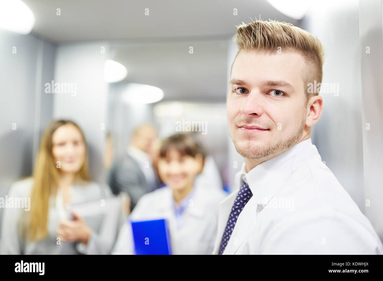 Young man as physician or doctor in medicine apprenticeship Stock Photo ...
