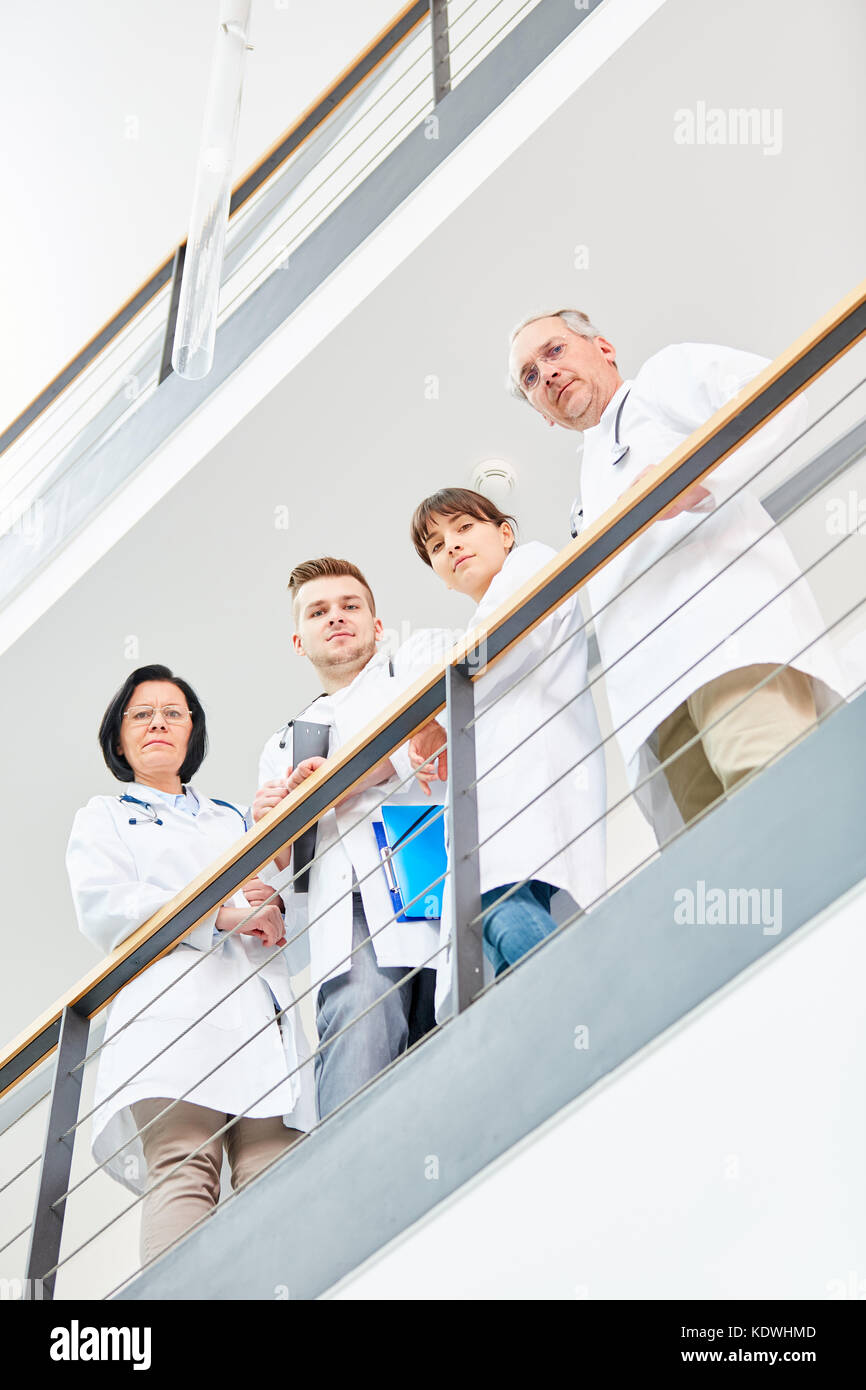 Group of physicians and therapists as team in hospital Stock Photo - Alamy