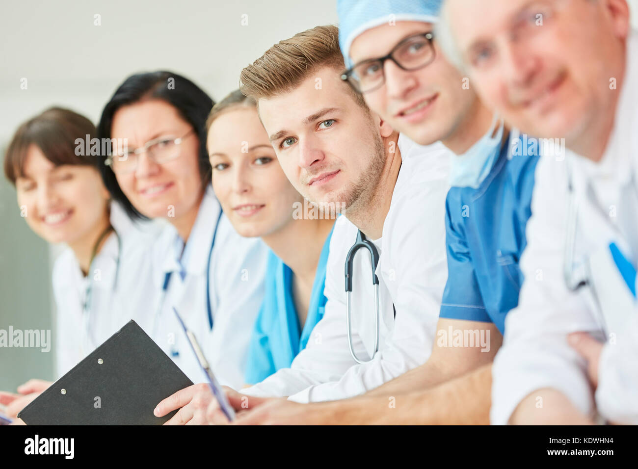 Young doctor and collegues as successful clinic team Stock Photo - Alamy
