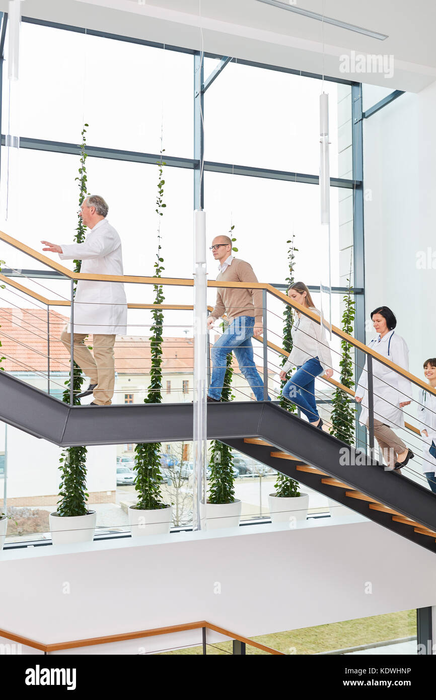Group of doctors as team in hospital or university walk together Stock ...