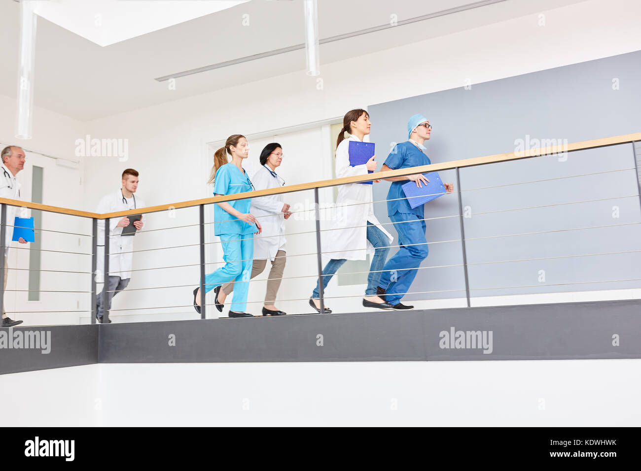Emergency in hospital with team of doctors running fast Stock Photo - Alamy