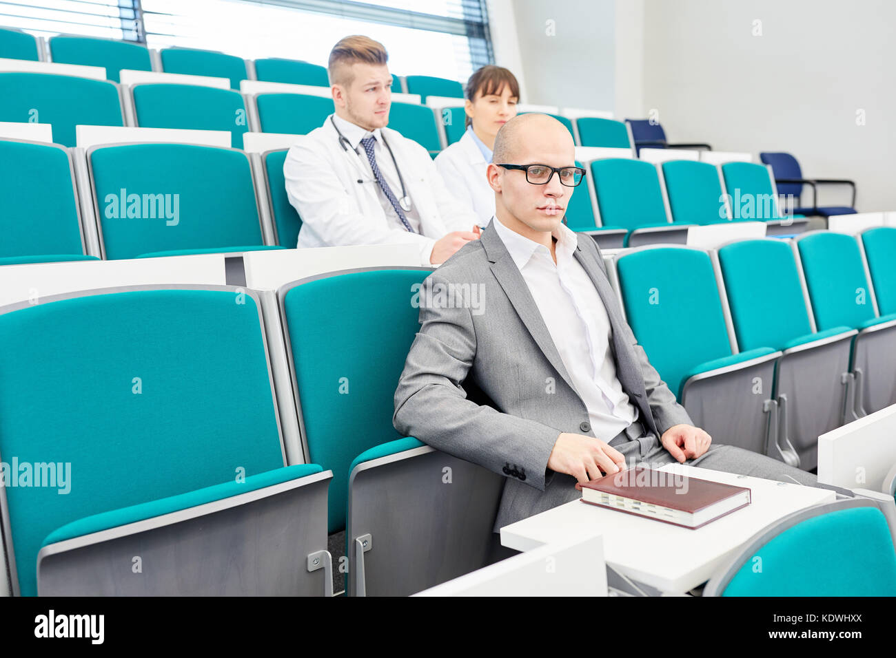 Man as medicine student learn in apprenticeship university hall Stock ...