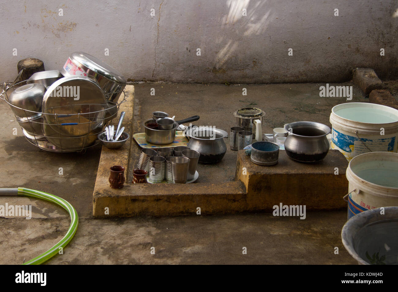 Washing the dishes Indian style Stock Photo - Alamy