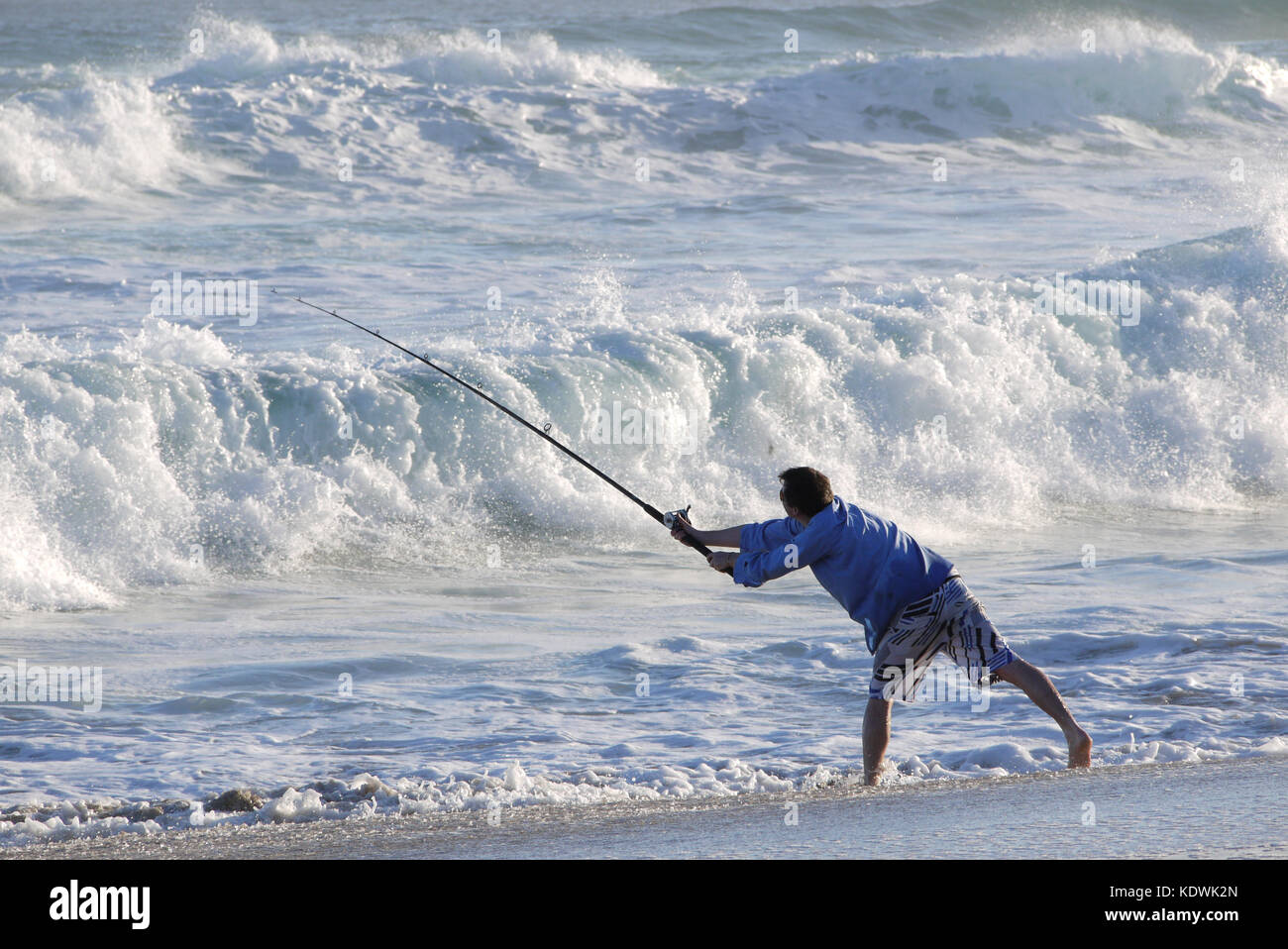 Lone shore fisherman hi-res stock photography and images - Alamy