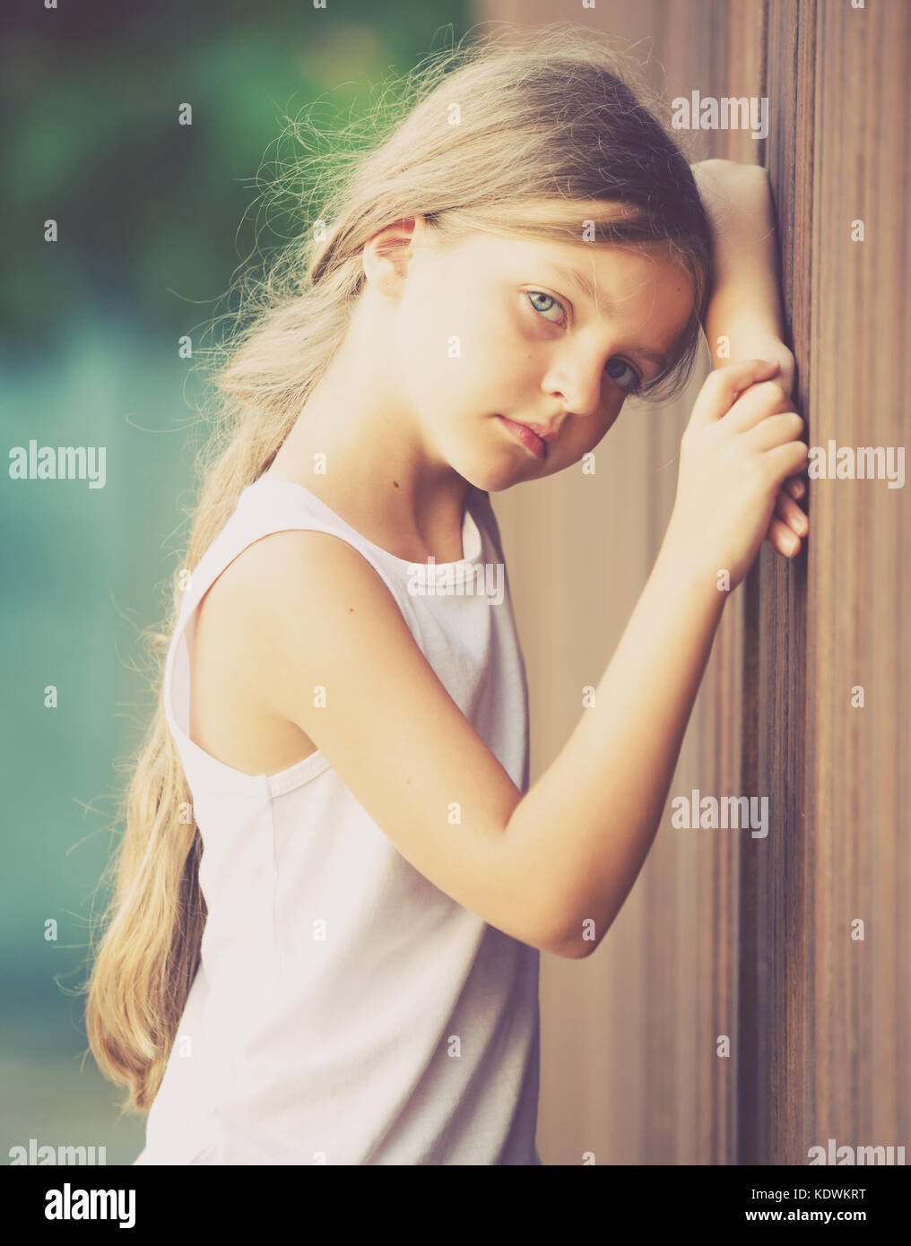 Depressed school girl sitting alone hi-res stock photography and images ...