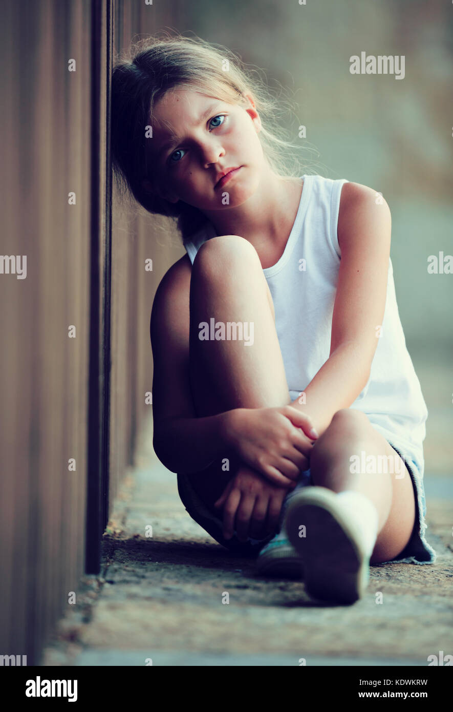 portrait of sad girl being alone and worried outdoors Stock Photo - Alamy