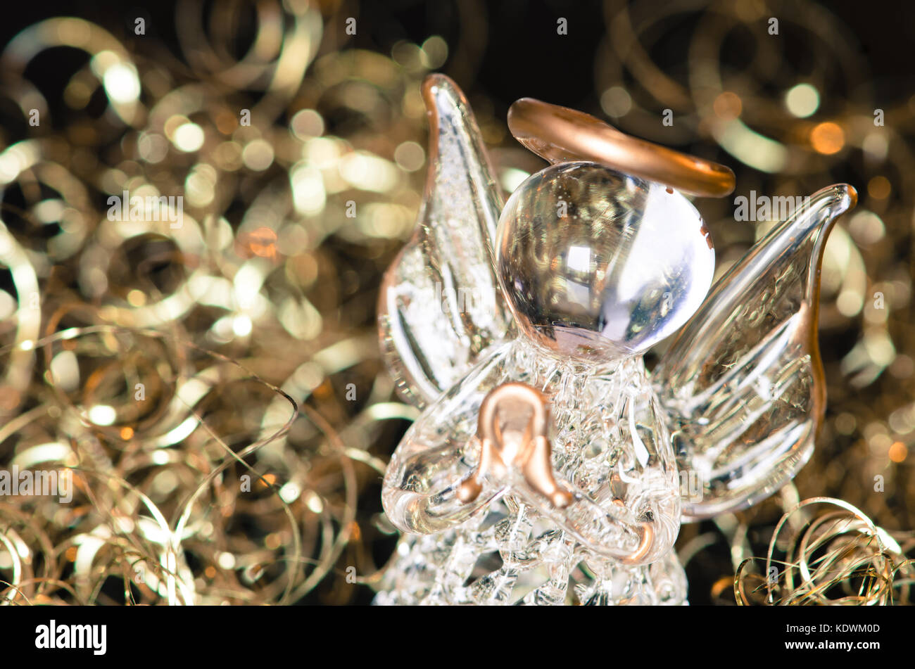 little vitreous angel on golden background Stock Photo - Alamy