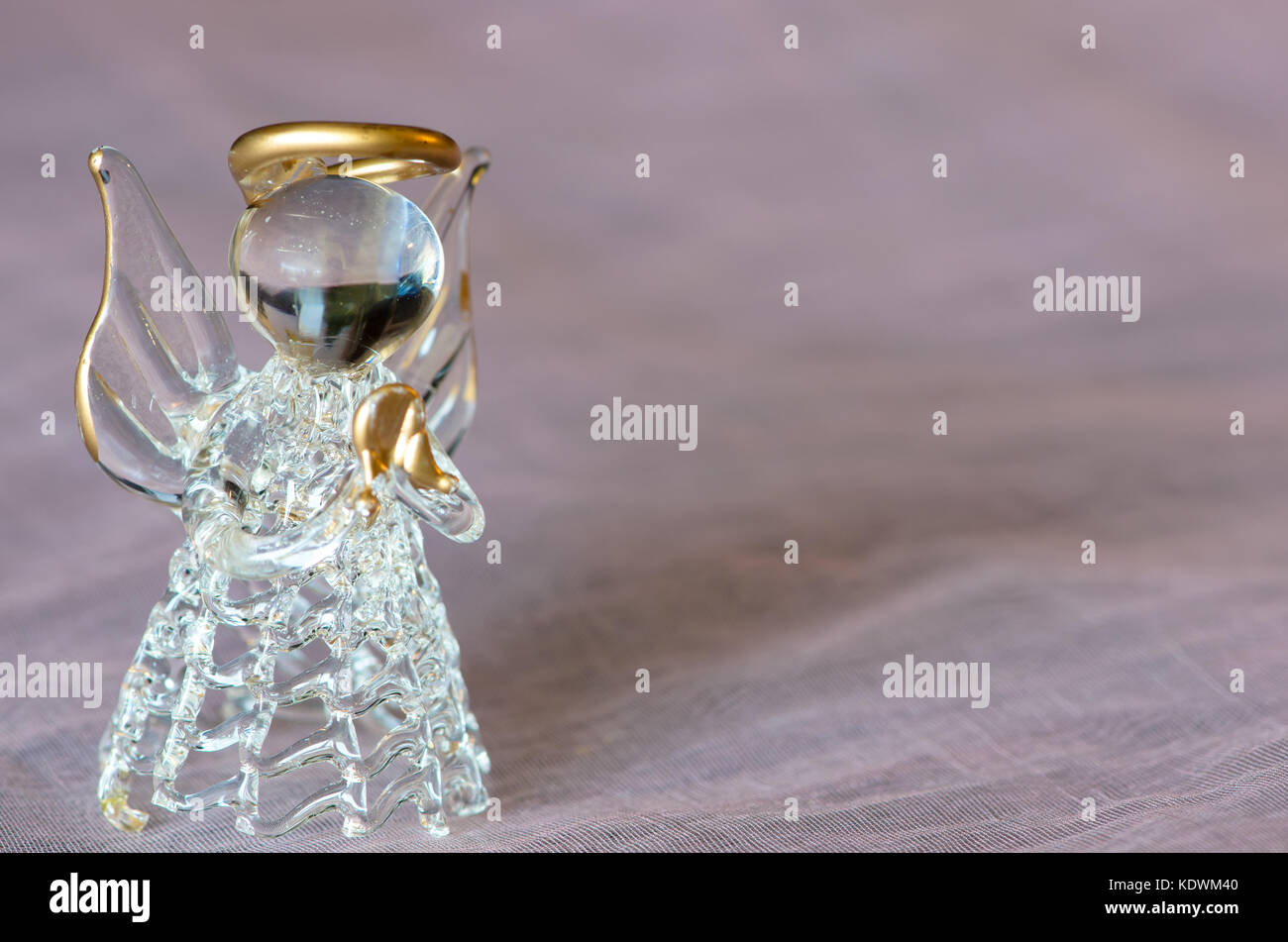 little vitreous angel on pink background Stock Photo - Alamy