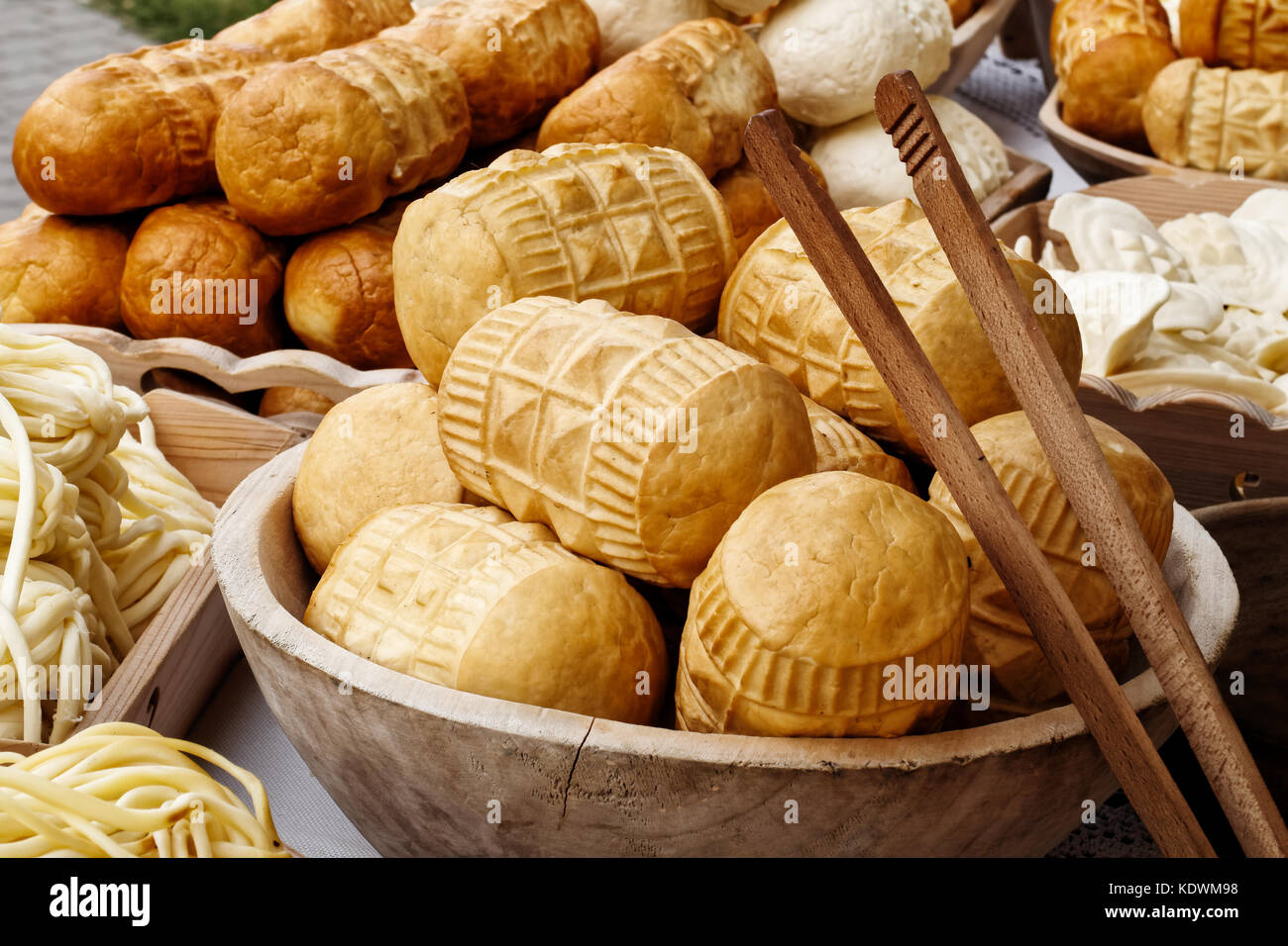 Many kinds of oscypek smoked cheese at market Stock Photo - Alamy