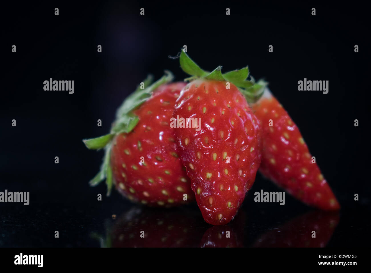 Bright red strawberry fruit healthy food Stock Photo - Alamy