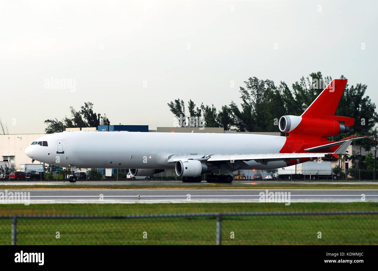 Large size MD-11 jet airplane taxiing Stock Photo - Alamy