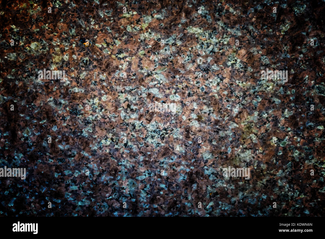 Natural hard rock or stone texture surface as background. Darken from ...