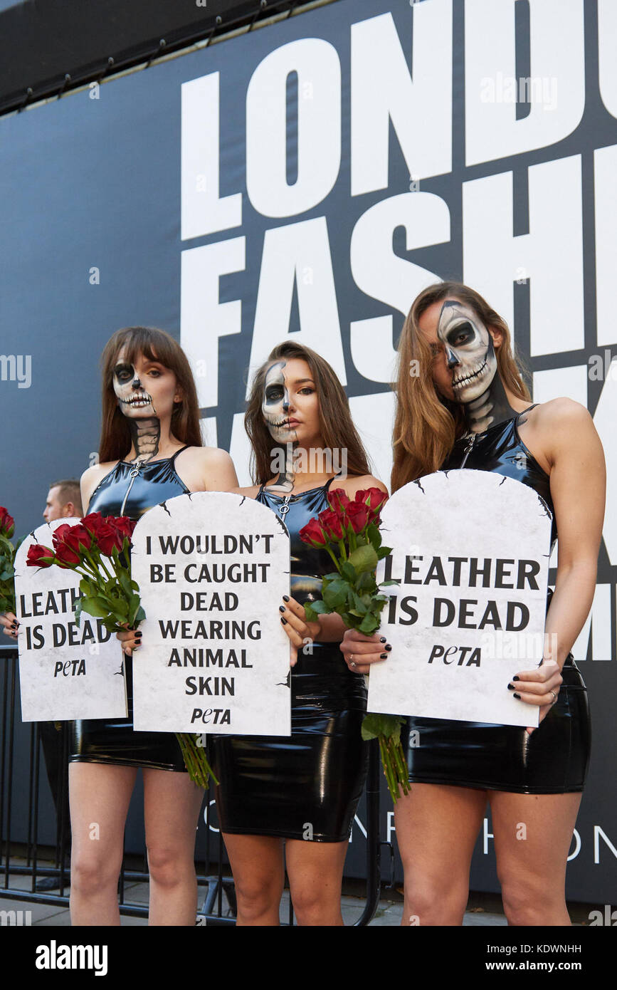 Wearing skin-tight vegan leather dresses and skeleton-like face paint ...