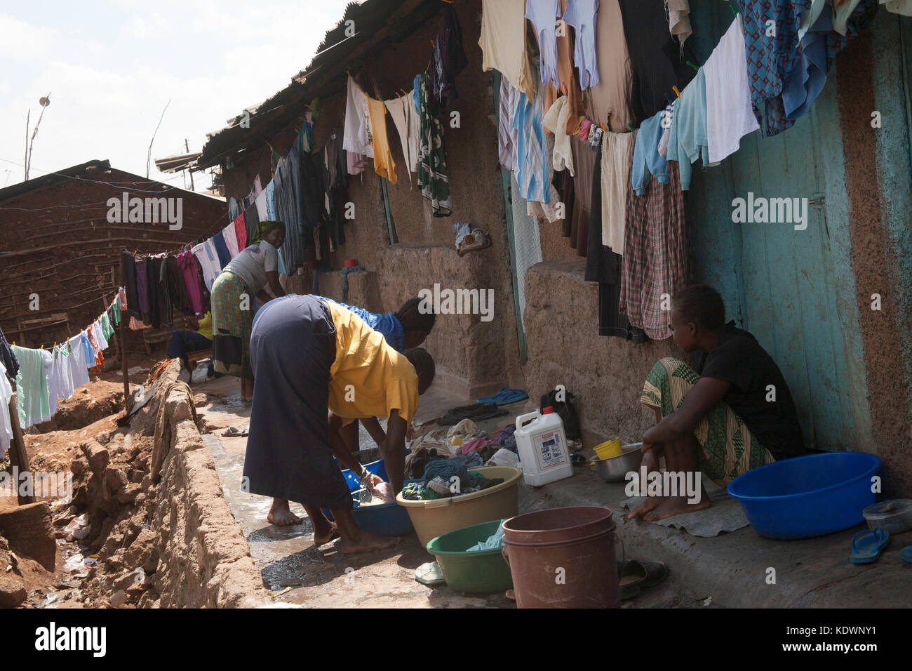 Women washing clothes in Kibera slum, Nairobi, Kenya, East Africa Stock ...
