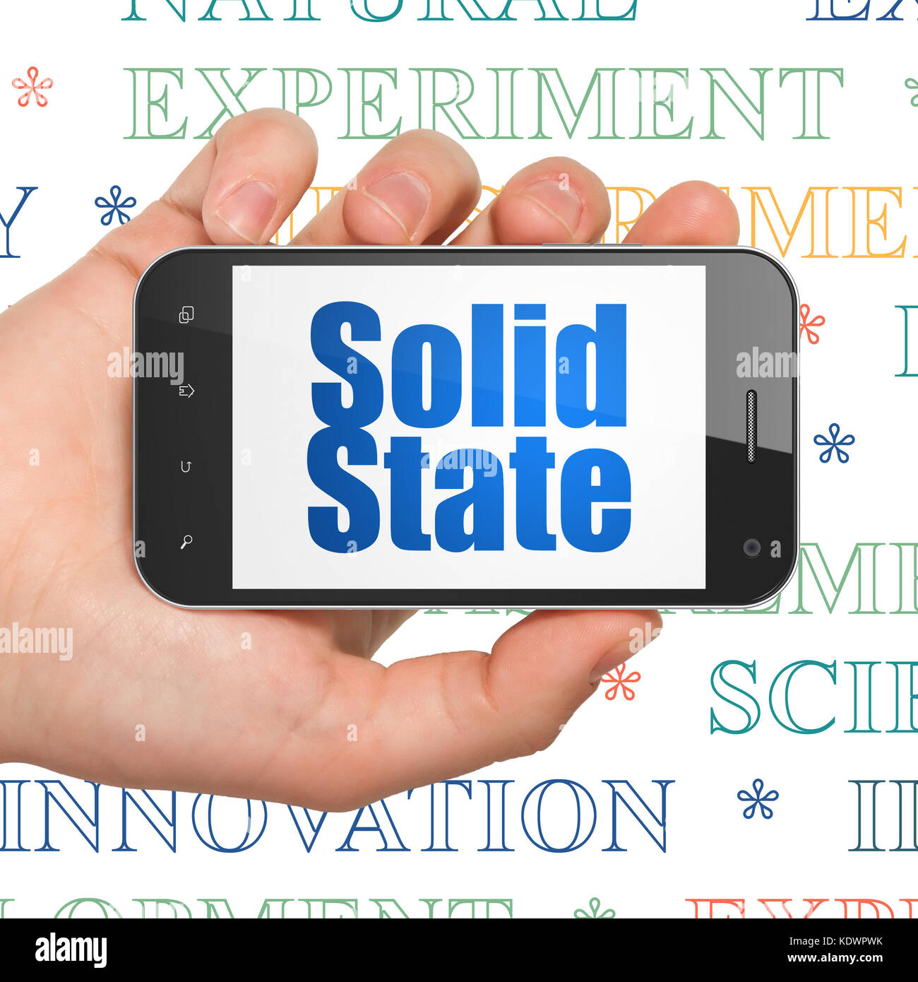 Science concept: Hand Holding Smartphone with Solid State on display ...