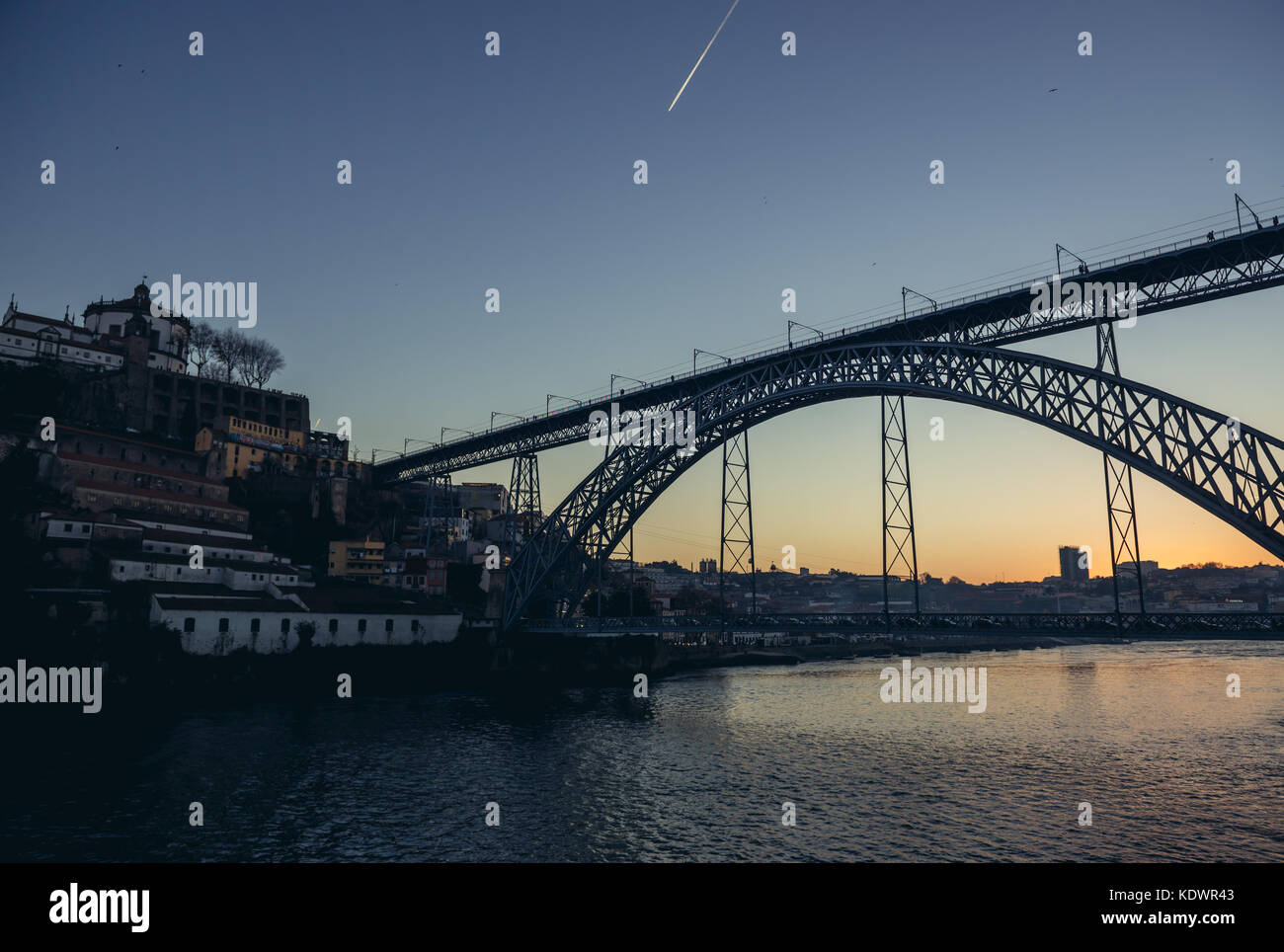 Sunset view with Dom Luis I Bridge connected cities of Porto and Vila ...