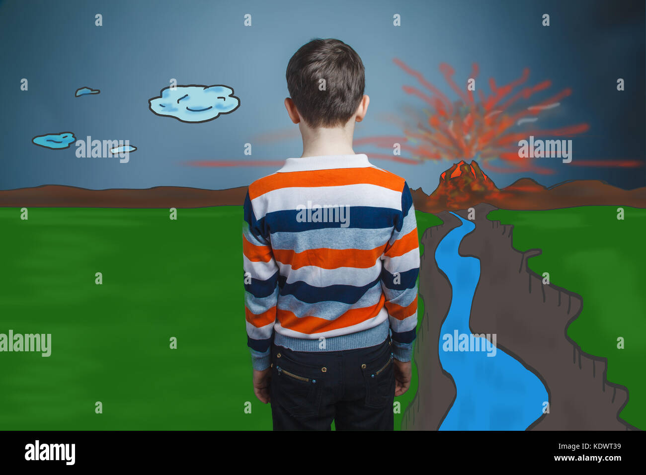 Teen boy is turned back to let his hands reflects eruption of la Stock ...